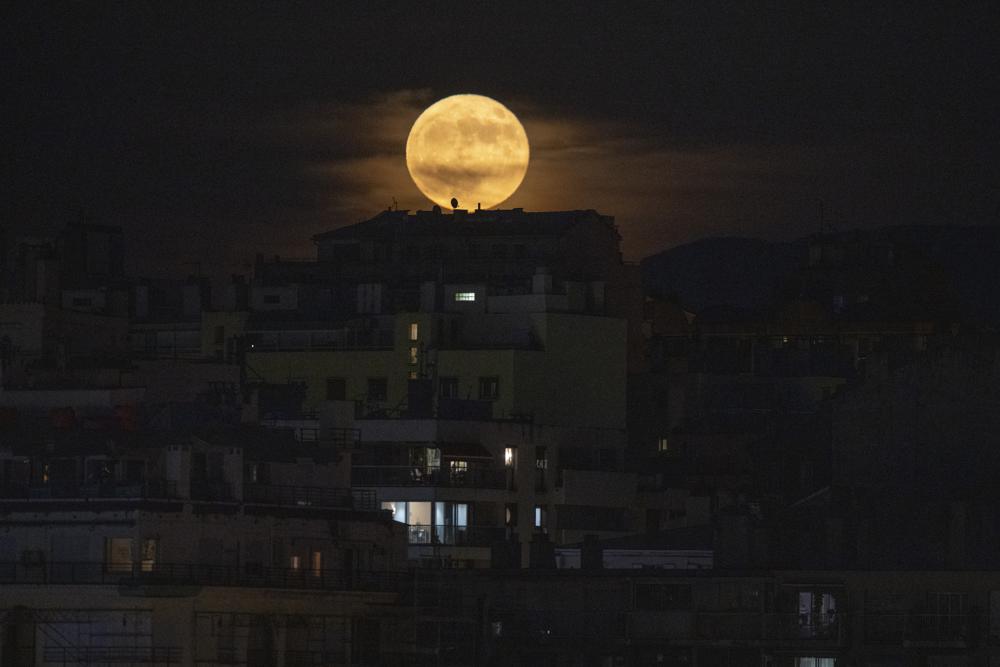 June's Strawberry Moon In Photos - ABC News